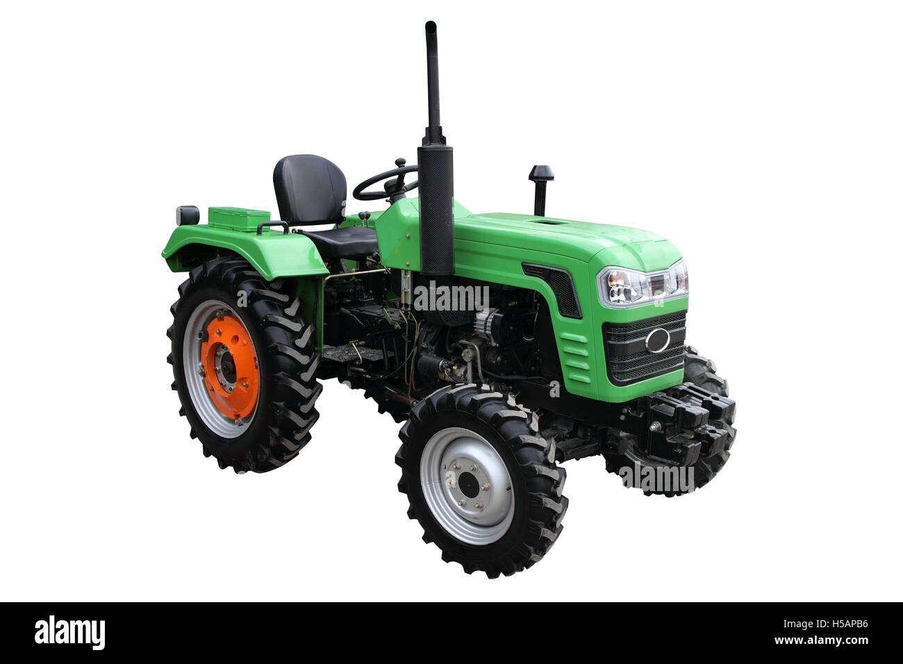Green tractor separately on a white background Stock Photo - Alamy