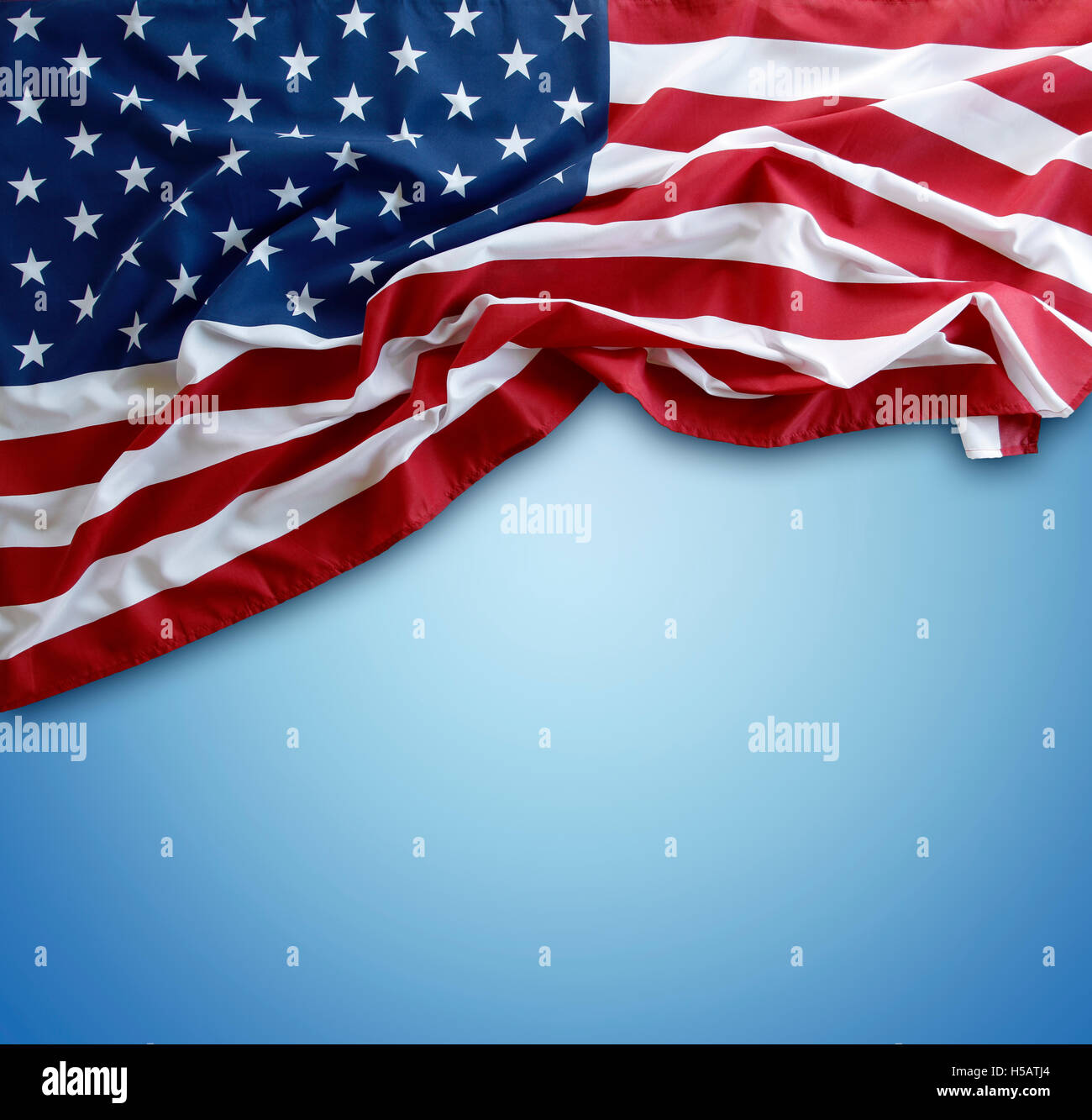 American flag on blue background Stock Photo - Alamy