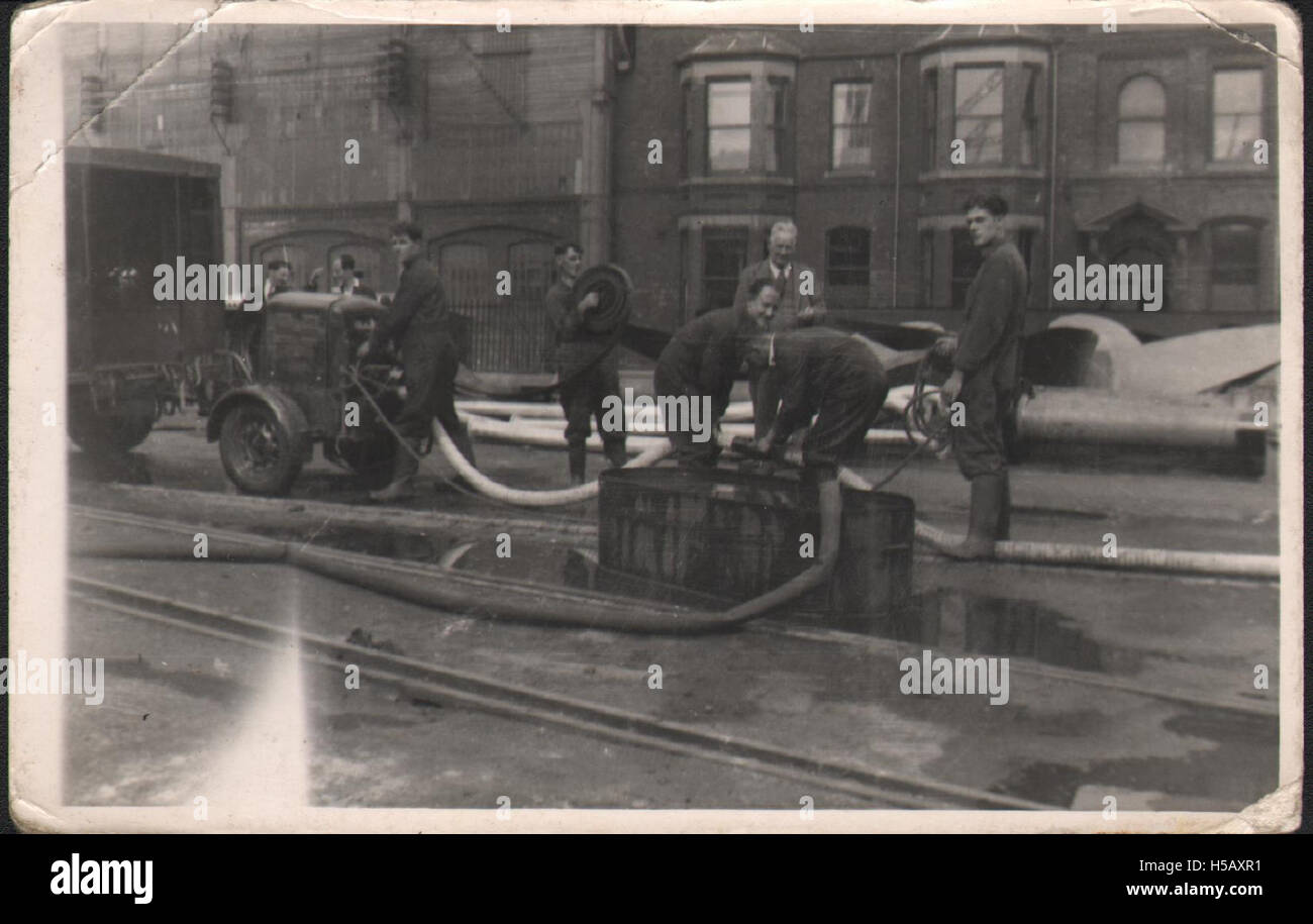 This image depicts firemen responding to a fire at a match factory in ...