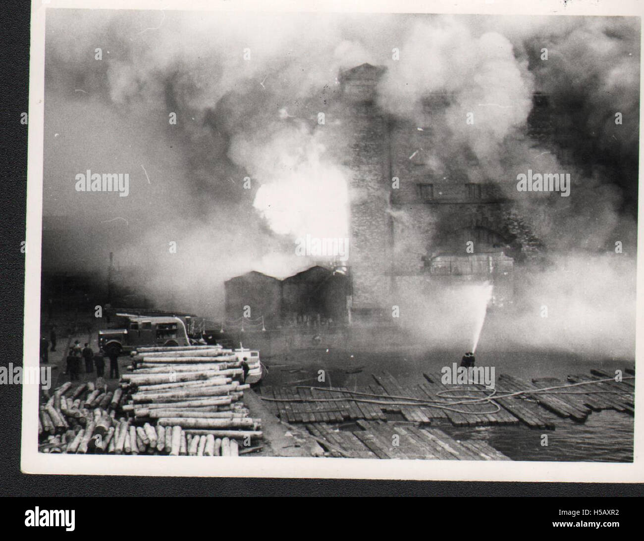This photograph shows the aftermath of the 1954 match factory fire ...