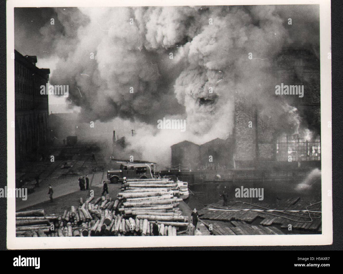 This image captures the devastating fire at a match factory in 1954 ...