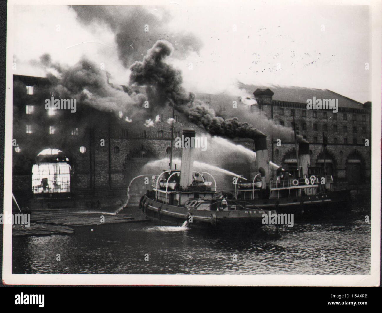 In 1954, six tugs were deployed to assist in extinguishing a fire at a ...