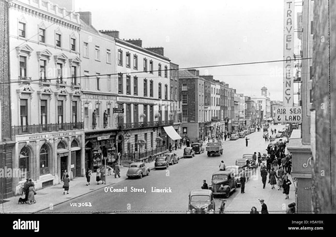 This photograph shows O'Connell Street in Limerick, Ireland, a central ...