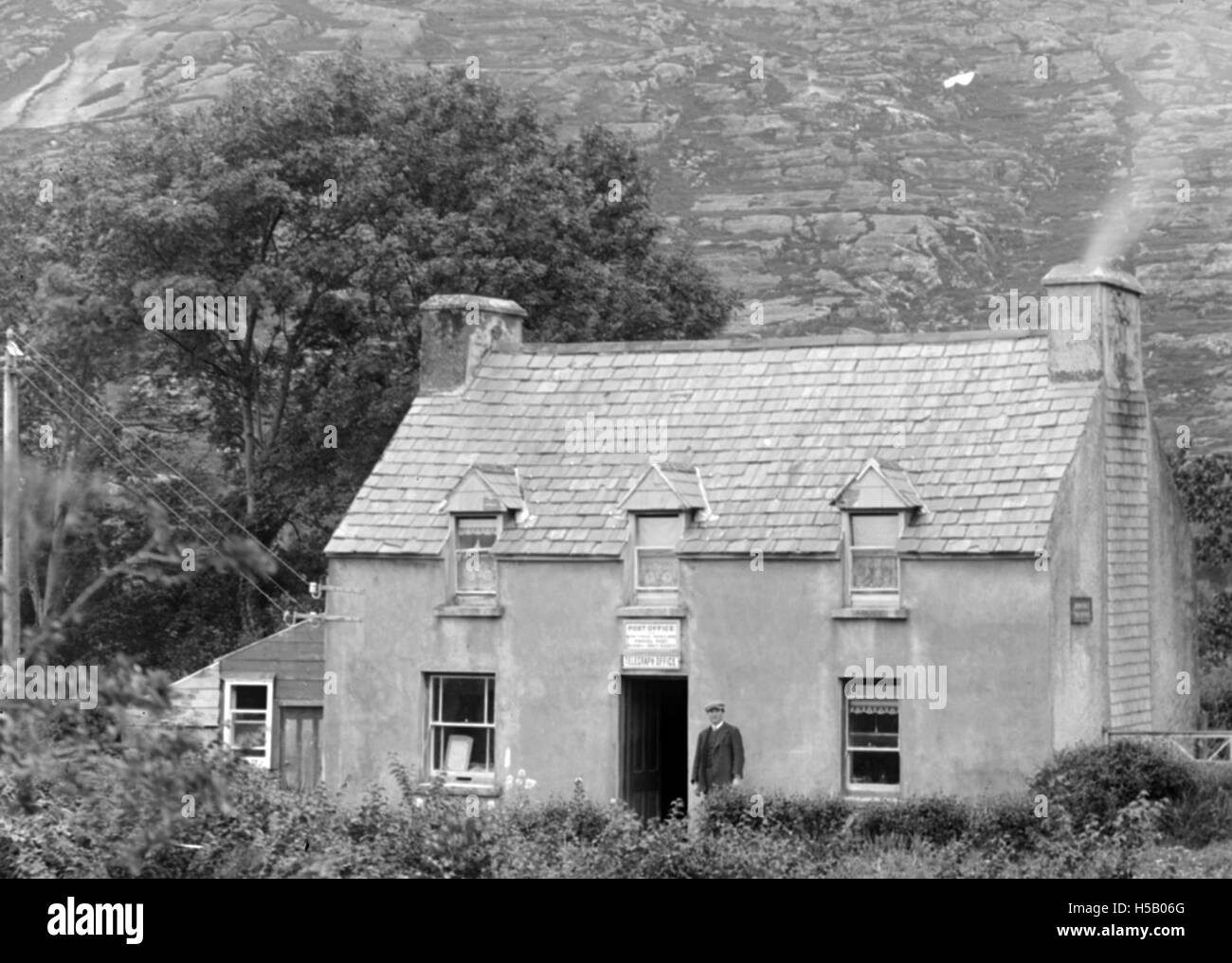 This photograph captures the telegraph office in Adrigole, a rural ...