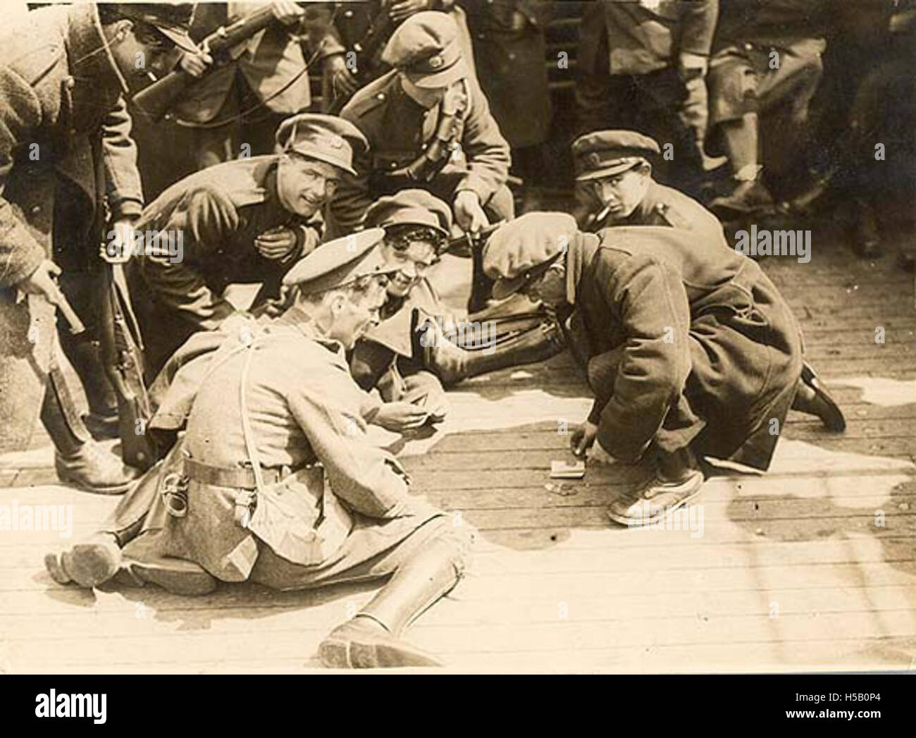 This photograph features a group of soldiers engaging in a recreational ...