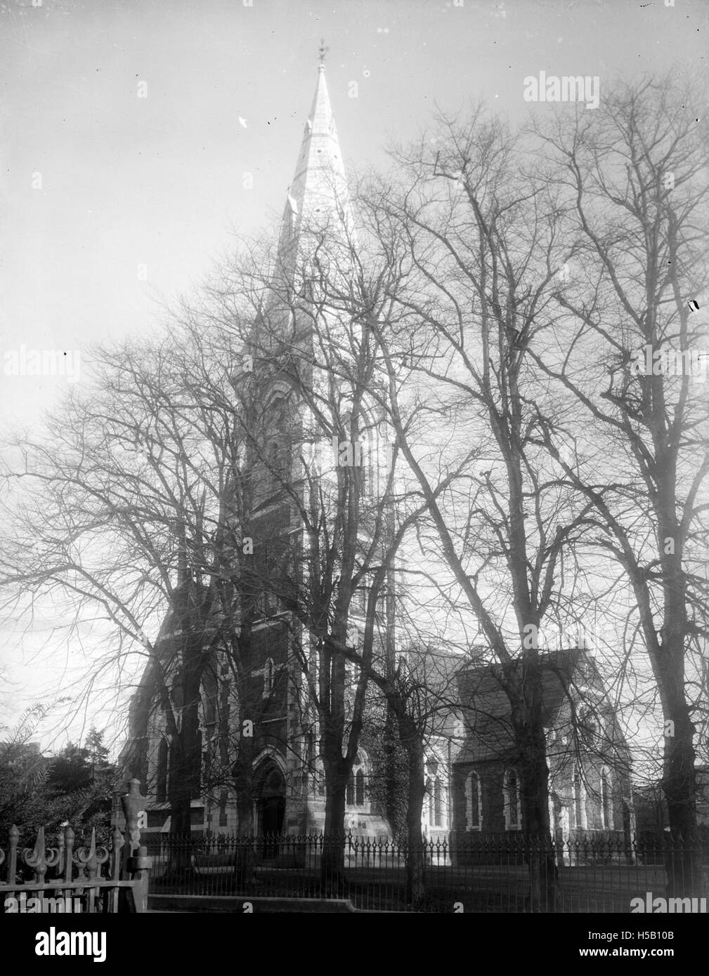 A view of a church building from the outside, framed by a surrounding ...