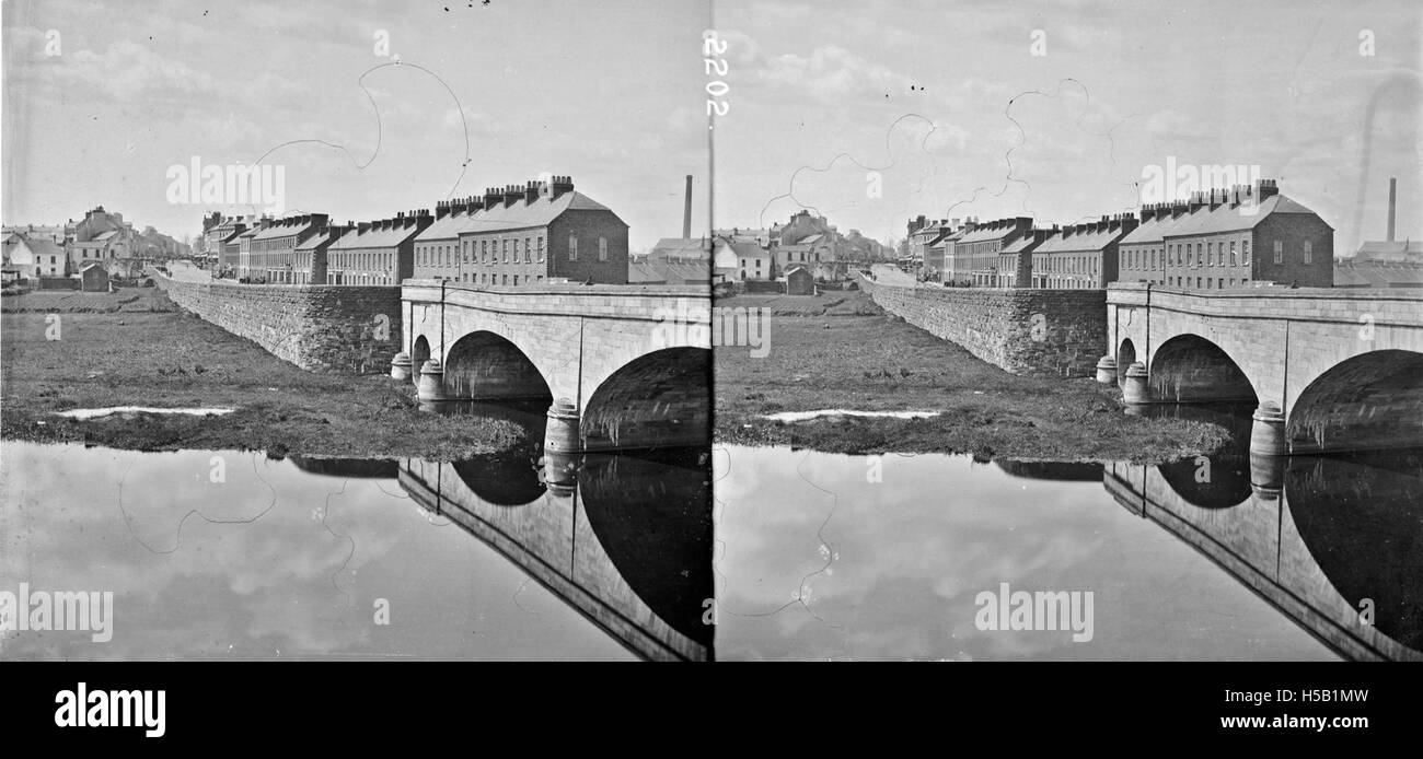 This image features a bridge with three arches spanning a river ...
