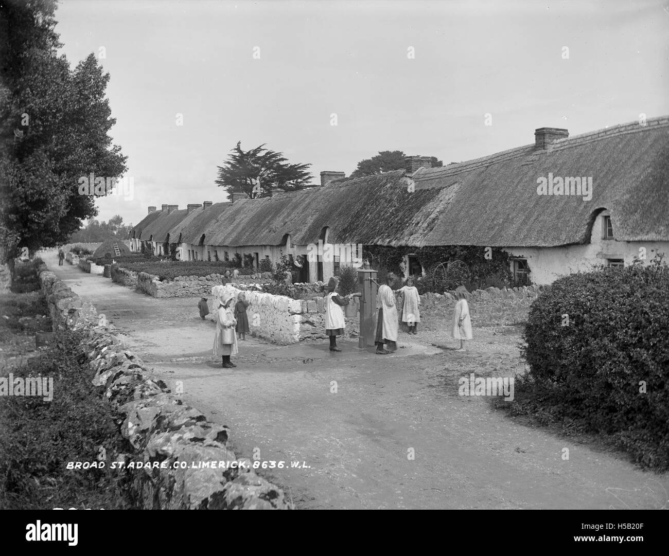 A historical photograph of Broad Street in Adare, a village in County ...