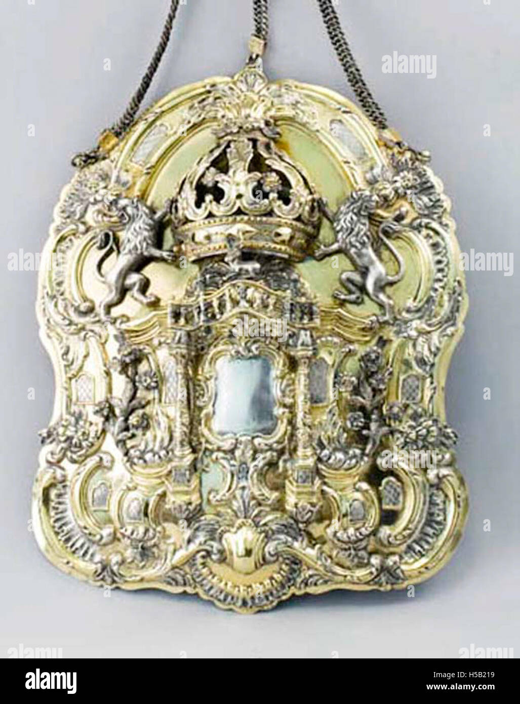 The Torah shield from Warsaw, Poland, is a ceremonial object made of ...
