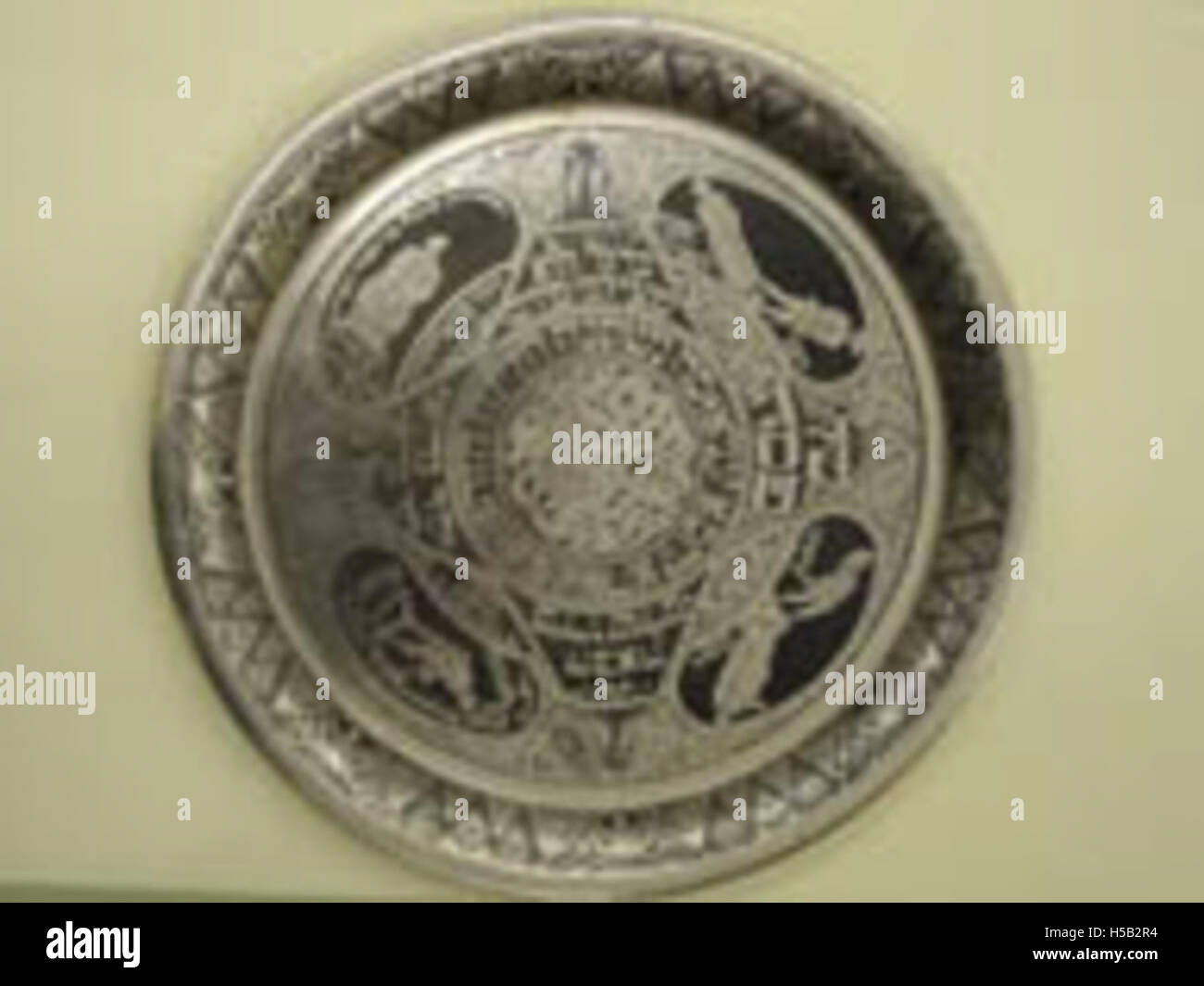 This image features a traditional Seder plate, used during the Jewish ...