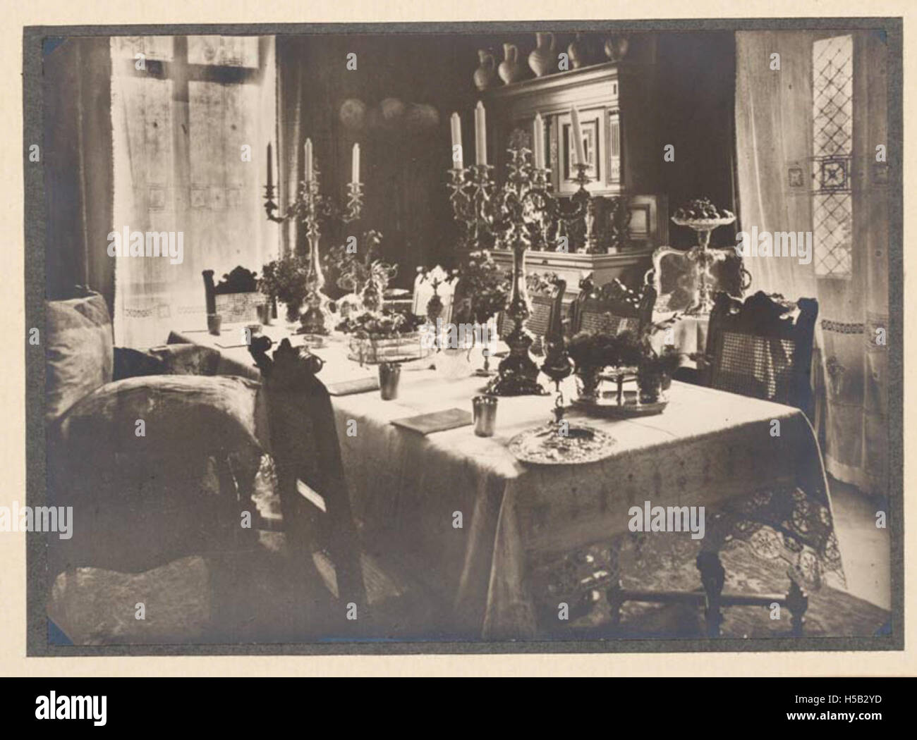 A historical image of a dining room table set for a Passover Seder at ...