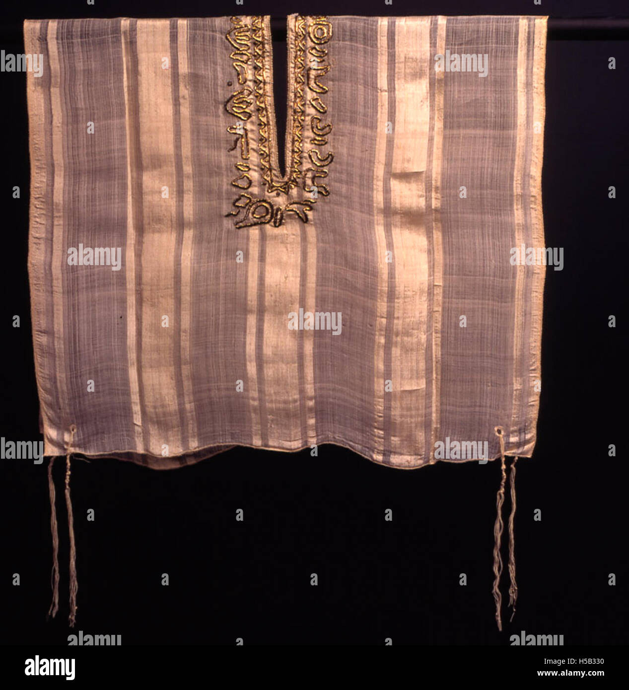 The Tallit Katan, a Jewish religious garment worn as part of daily ...