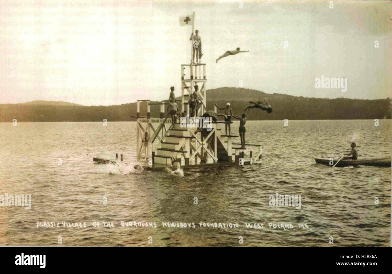 Campers at Hecht House Camp are seen jumping off a raft into the water ...
