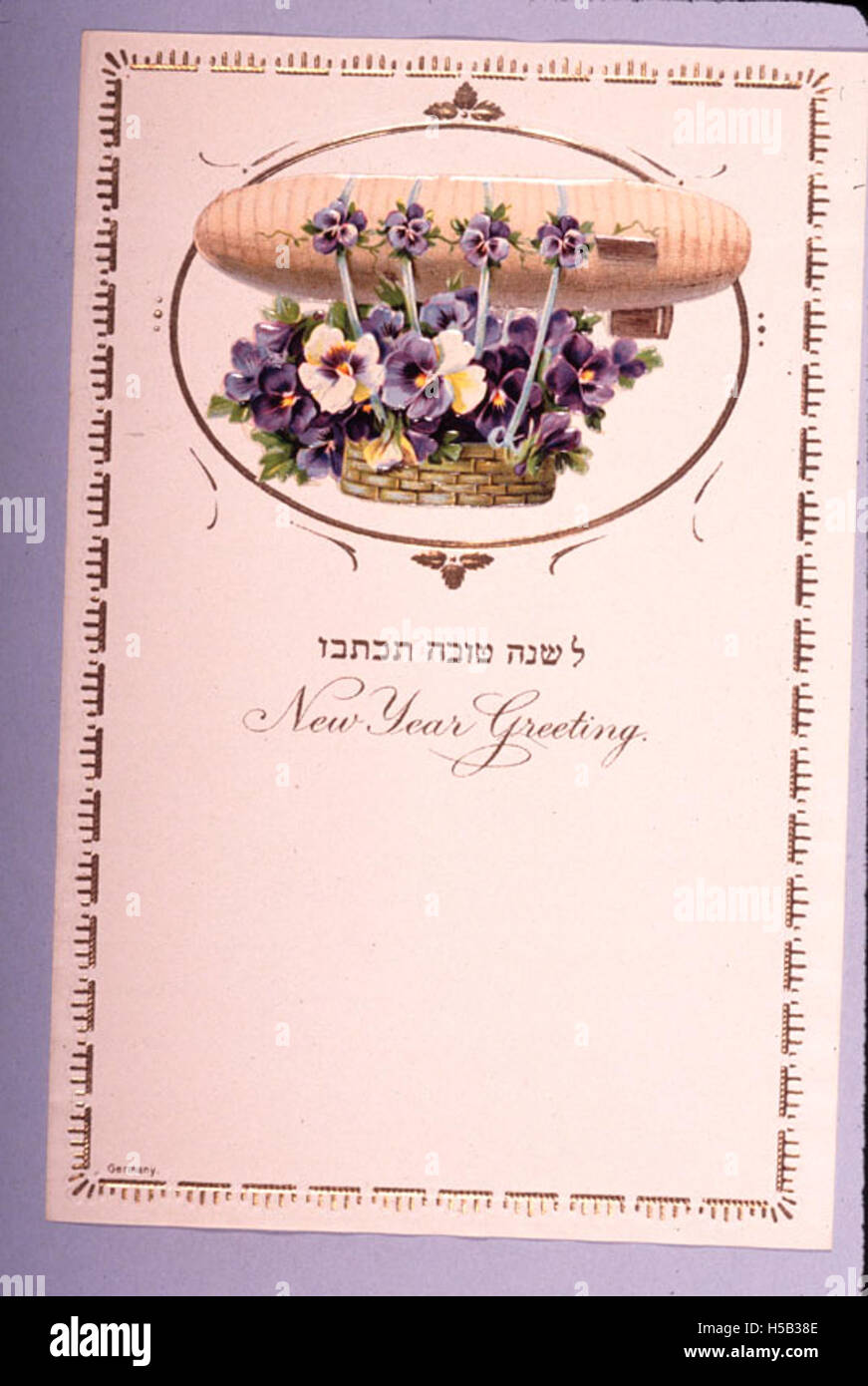 A Rosh Hashanah greeting card featuring a Happy New Year message ...