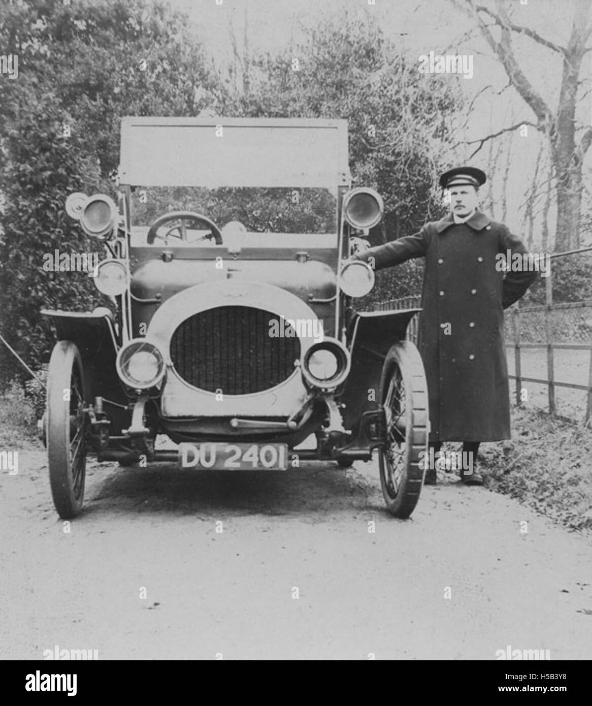 A photograph of a Riley car with chauffeur, likely taken around 1910 ...