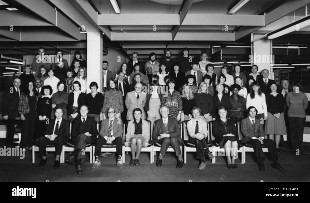 A photograph of library staff from the 1980s, showcasing the employees ...