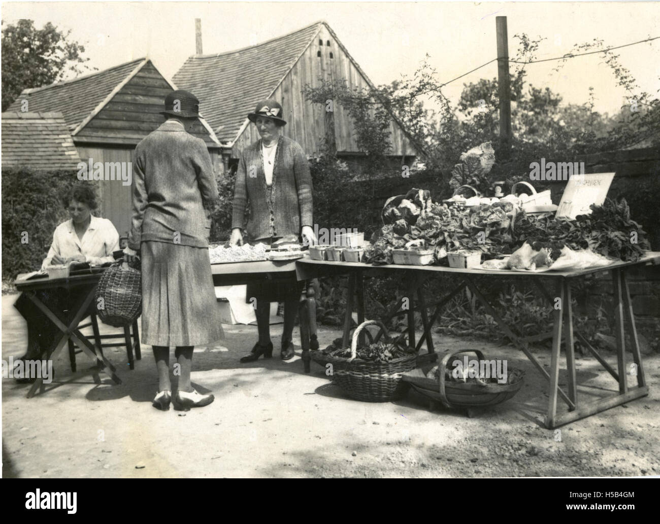 A photograph of a market stall in Kemerton Village, taken in June 1933 ...