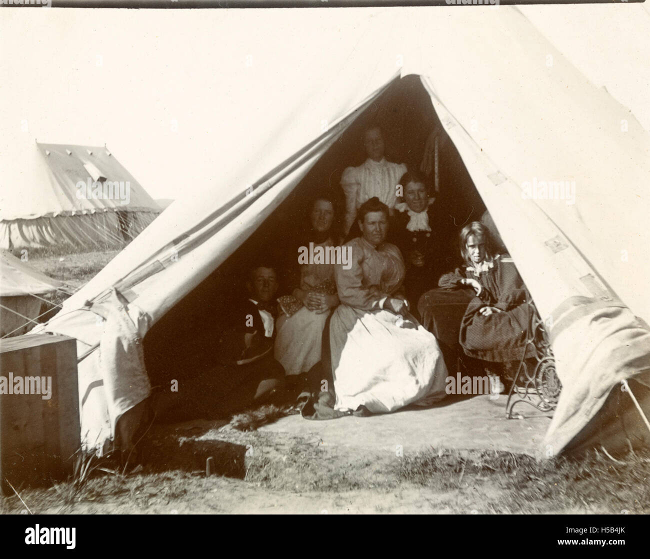 A photograph of a Boer family around 1901, likely taken during the ...