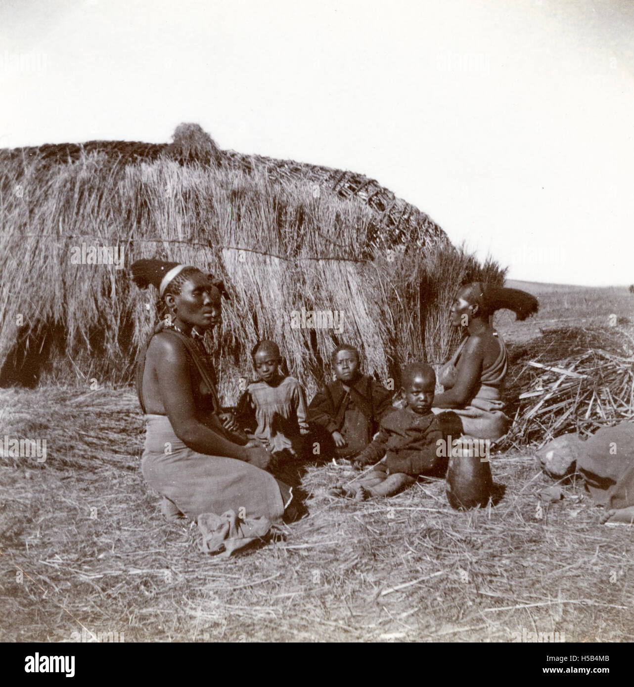 A historical photograph of a camp set up for native South Africans ...