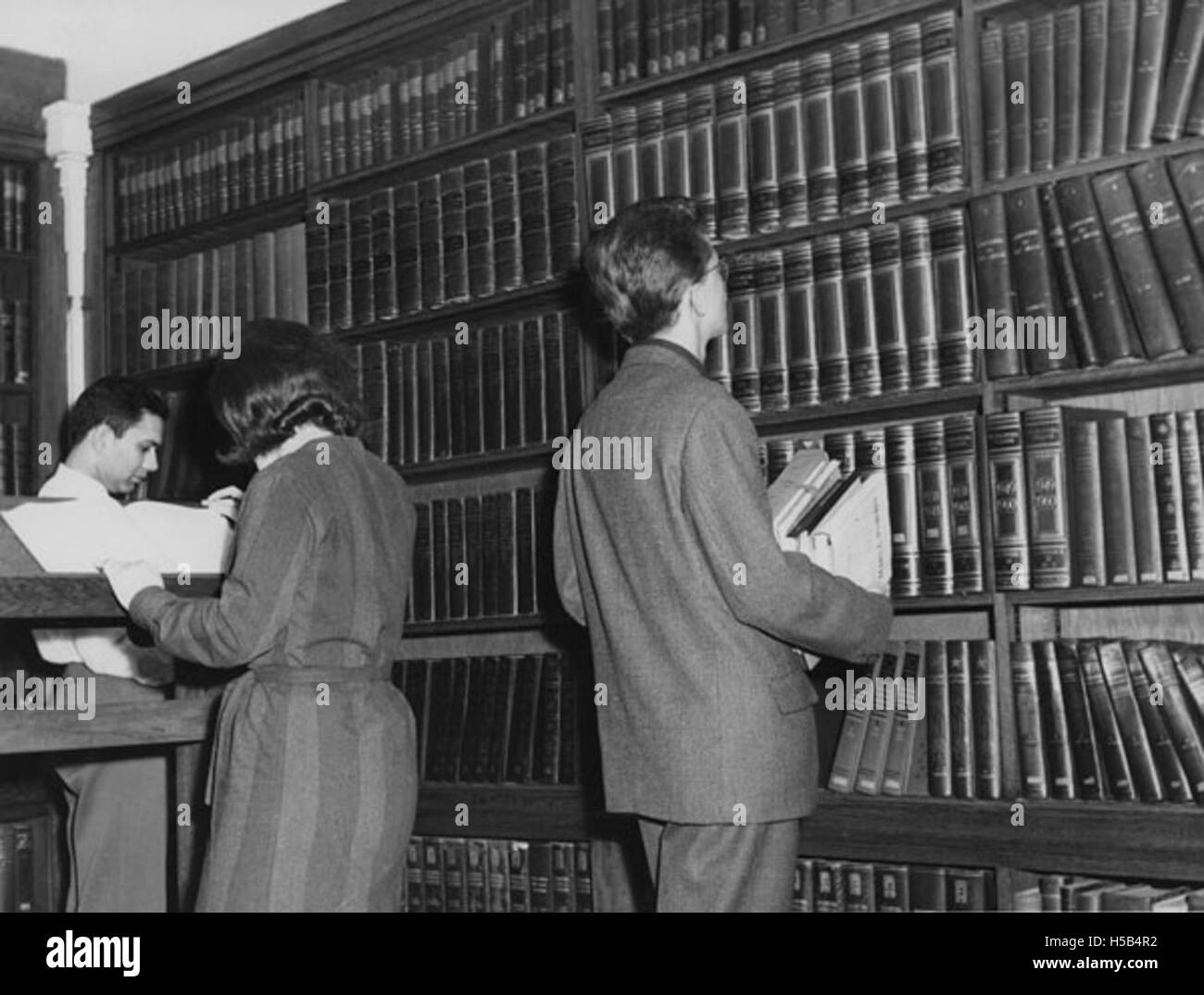 A library filled with encyclopedias, representing the knowledge and ...