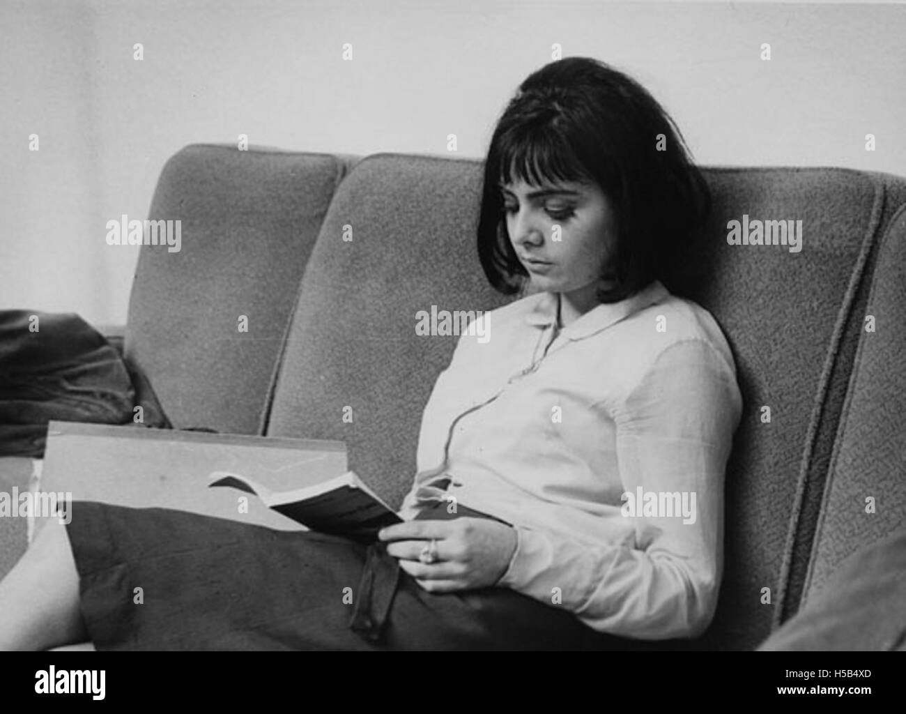 This photograph shows a student studying in the Shaw Library in 1964 ...