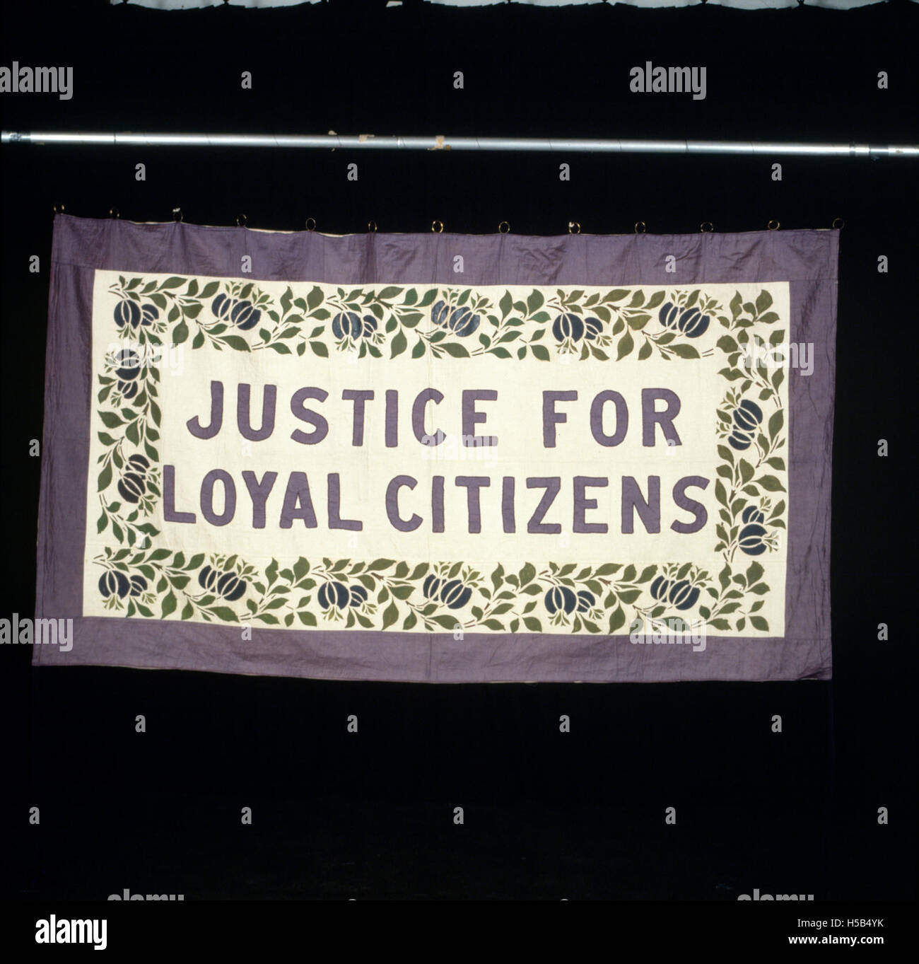 This banner represents the women's suffrage movement, a historical ...