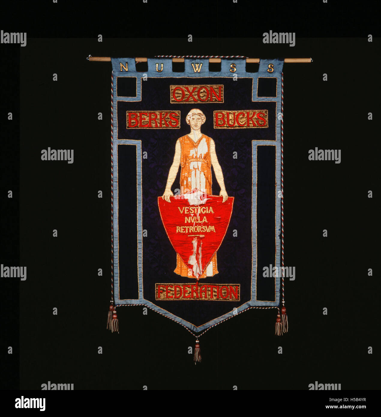 Similar to the previous title, this suffrage banner represents a ...