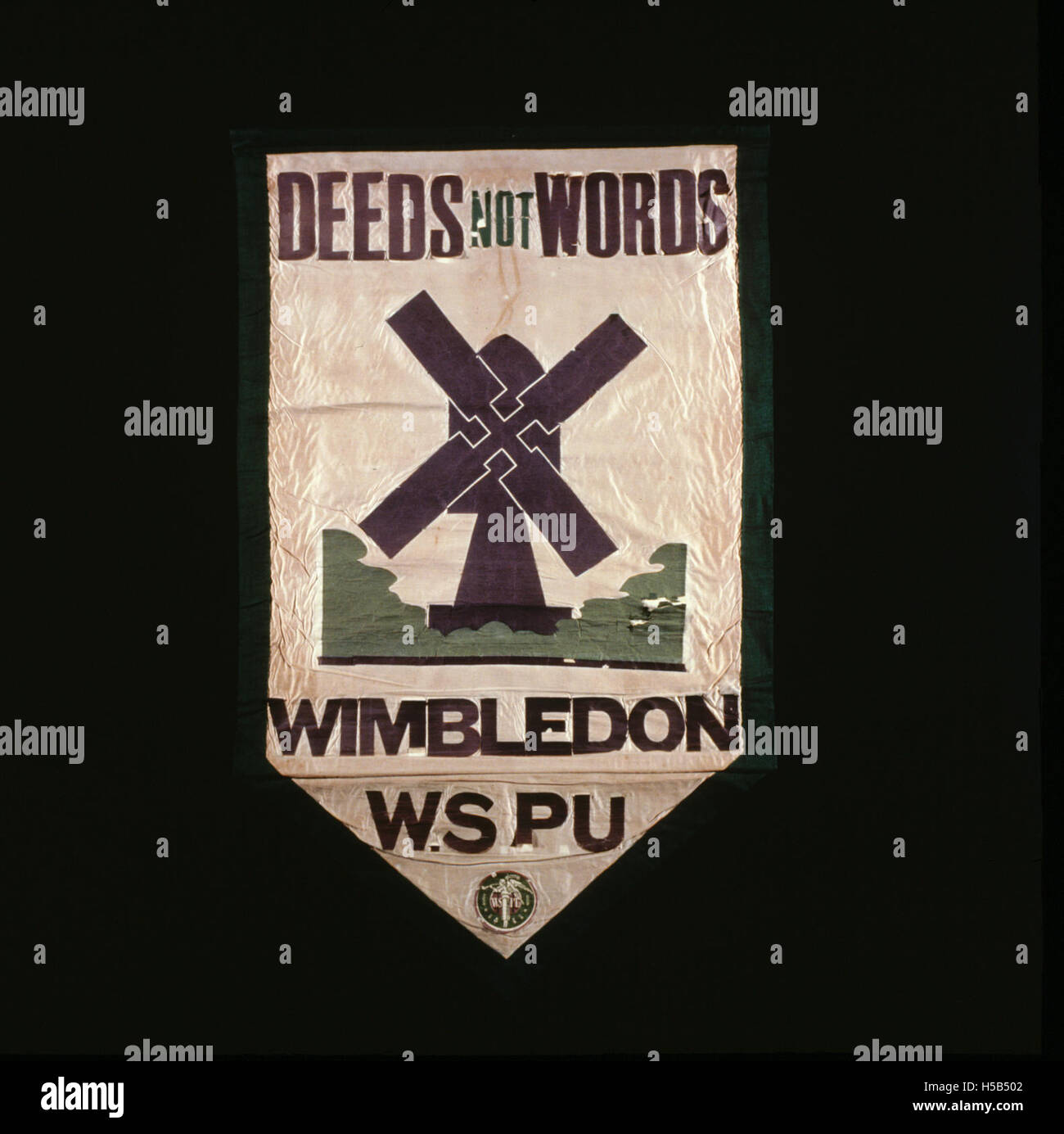 A suffrage banner from the early 20th century, advocating for women's ...