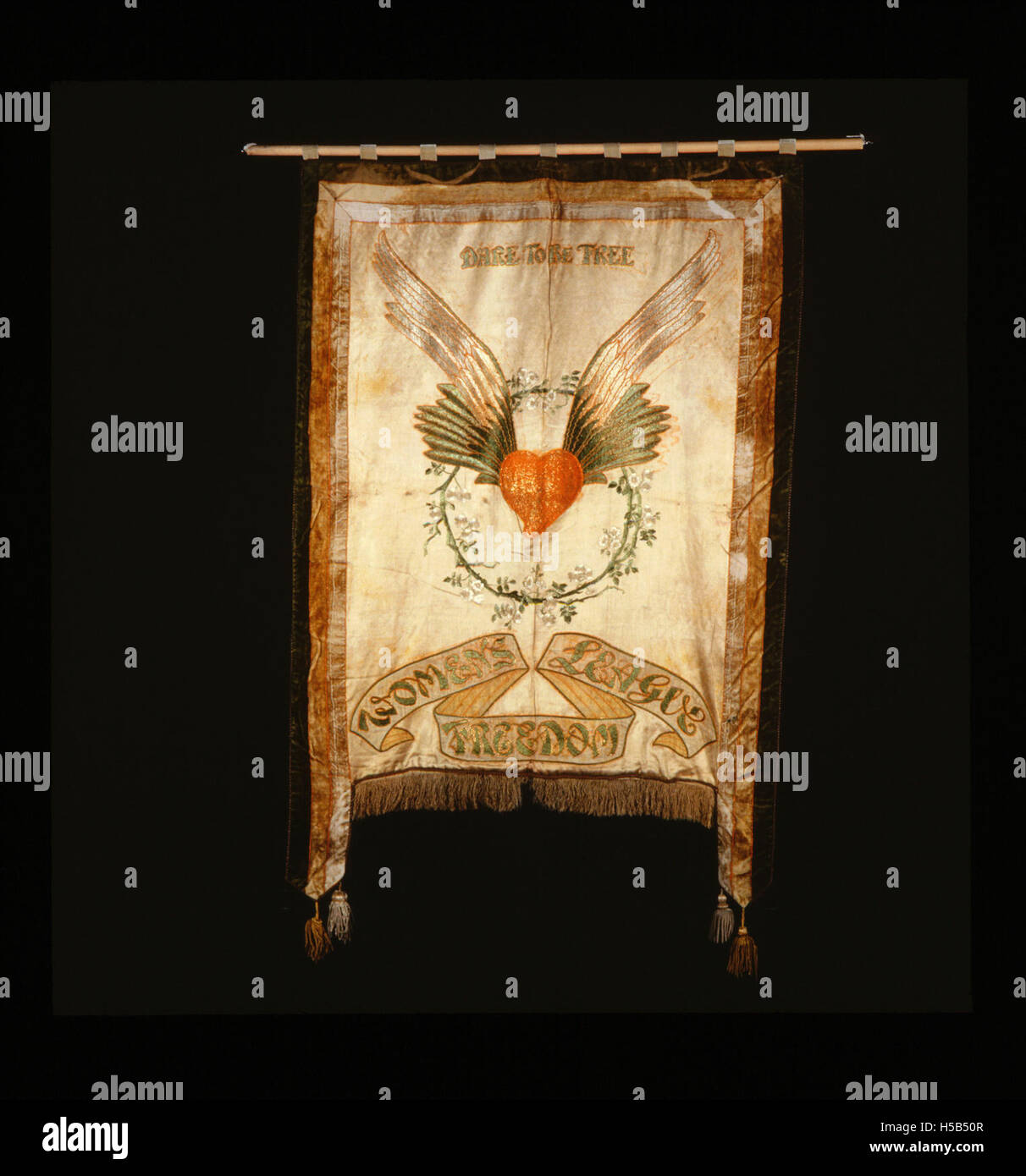 A historical image of a suffrage banner, likely from the early 20th ...