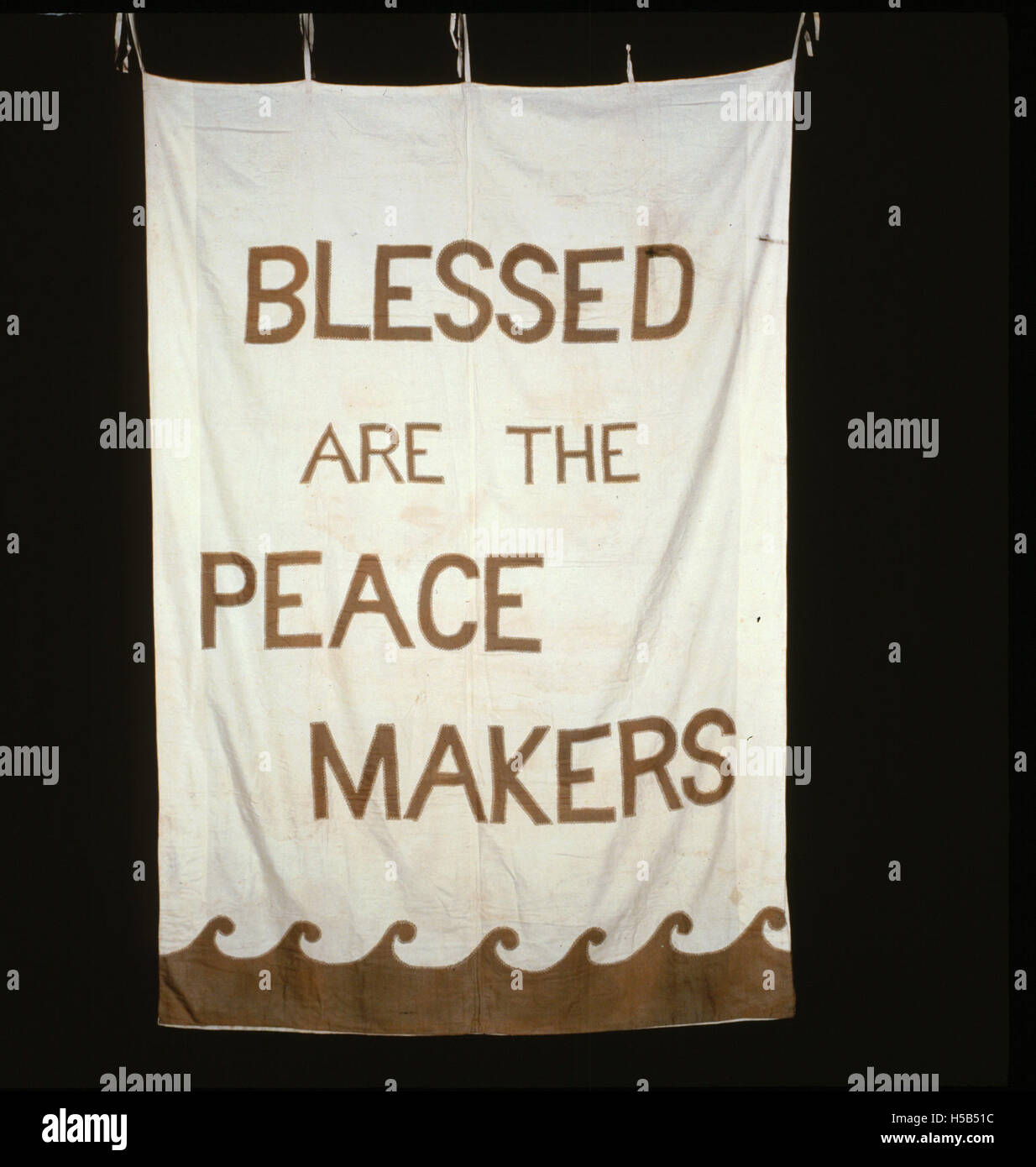 A historical photograph of a suffrage banner, likely from the early ...