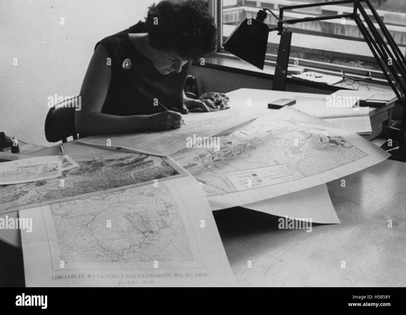 This photograph shows the Geography Drawing Office in 1964, where maps ...