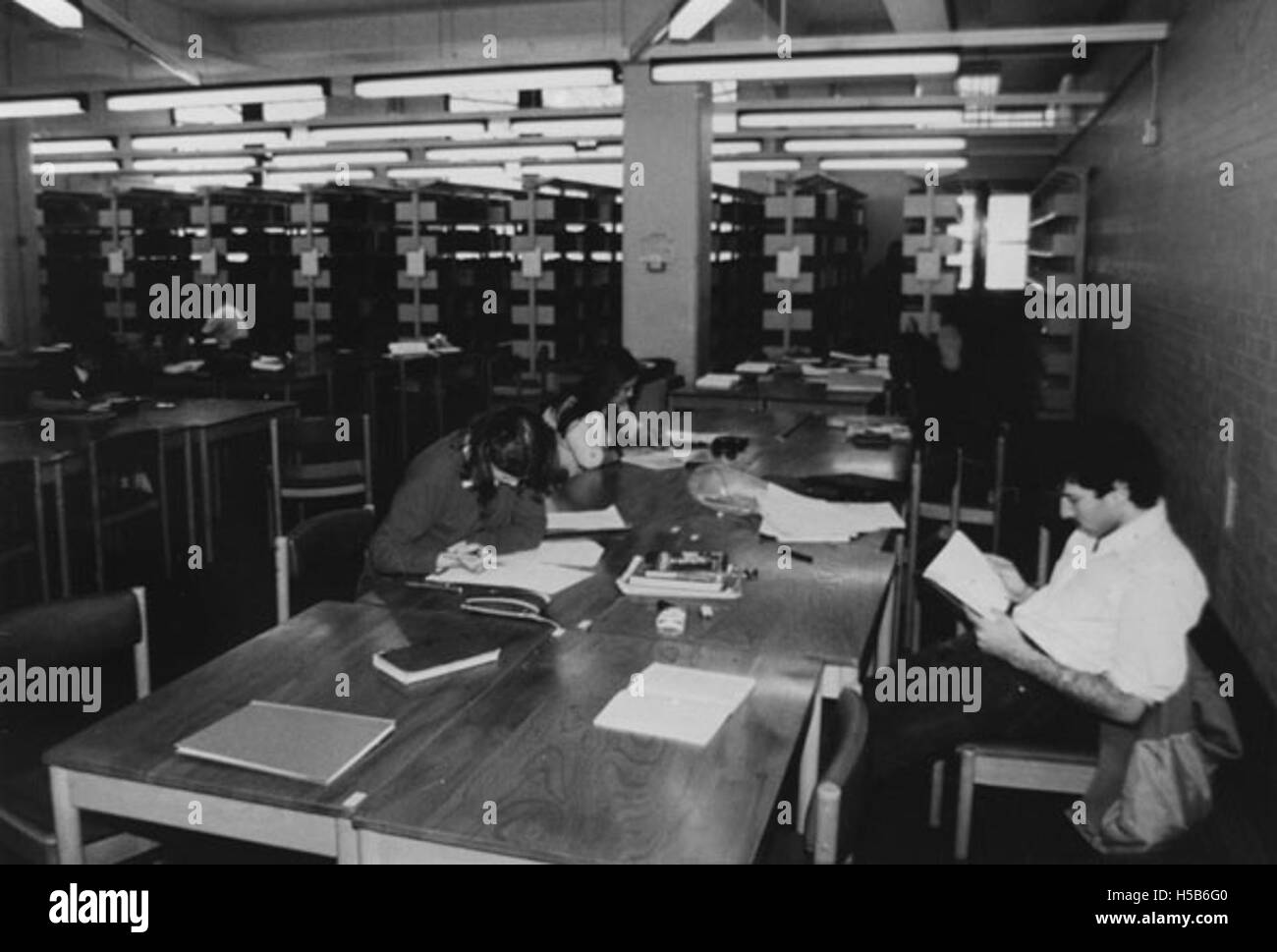 This photograph captures a library setting from around 1981, showing ...