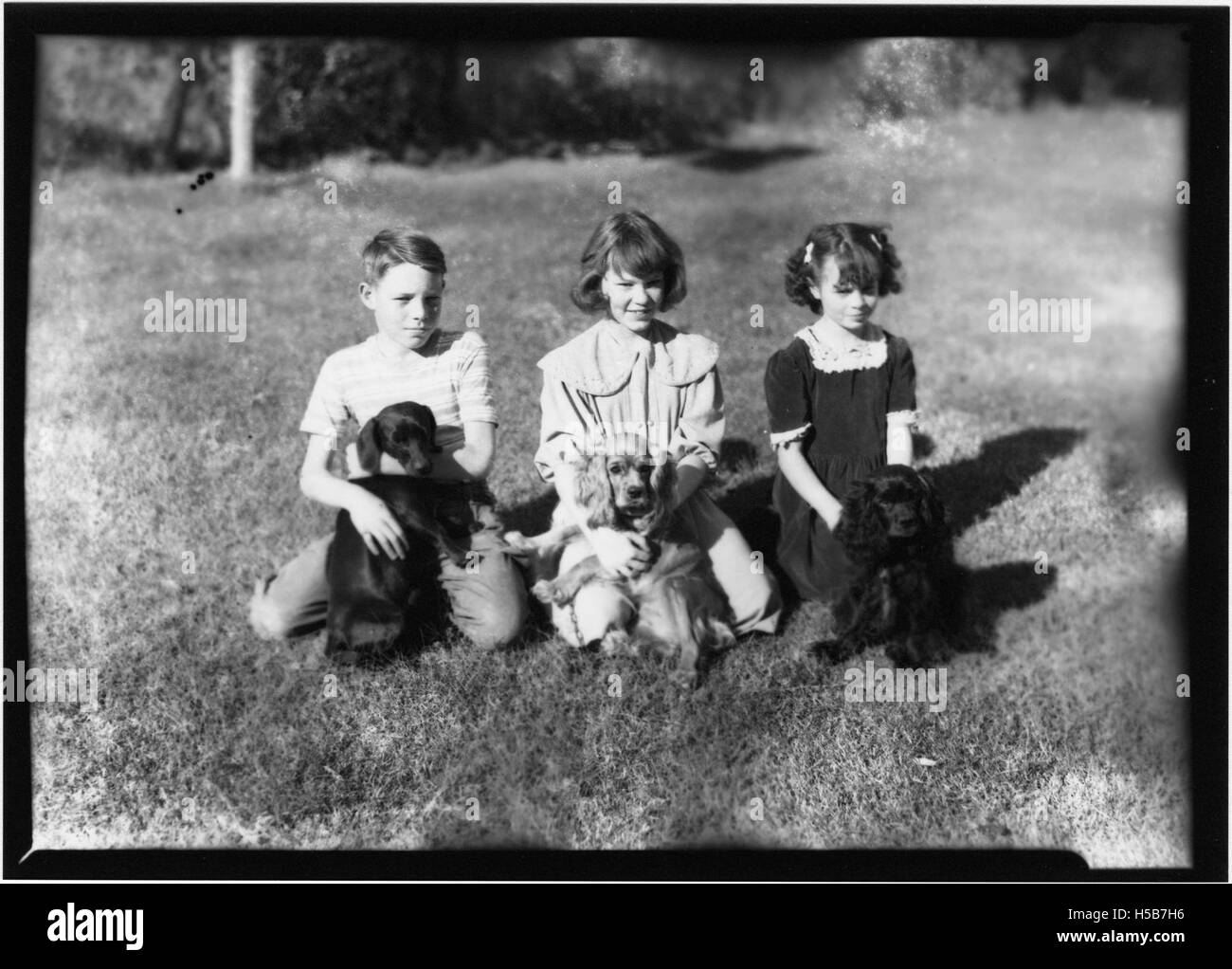 Photograph of three unidentified children Stock Photo - Alamy