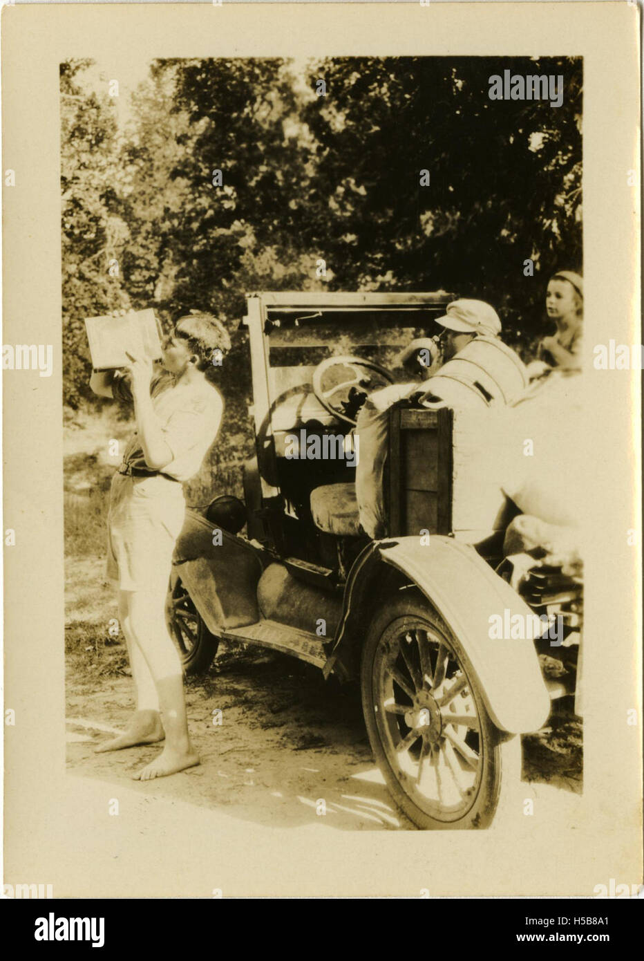 A group of Boy Scouts participating in outdoor activities, focusing on ...