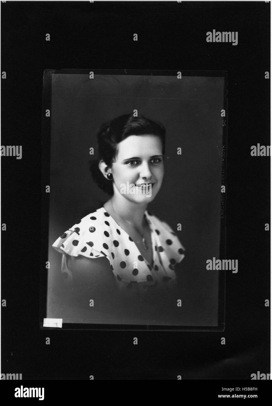 This portrait photograph shows an unidentified woman, possibly from a ...