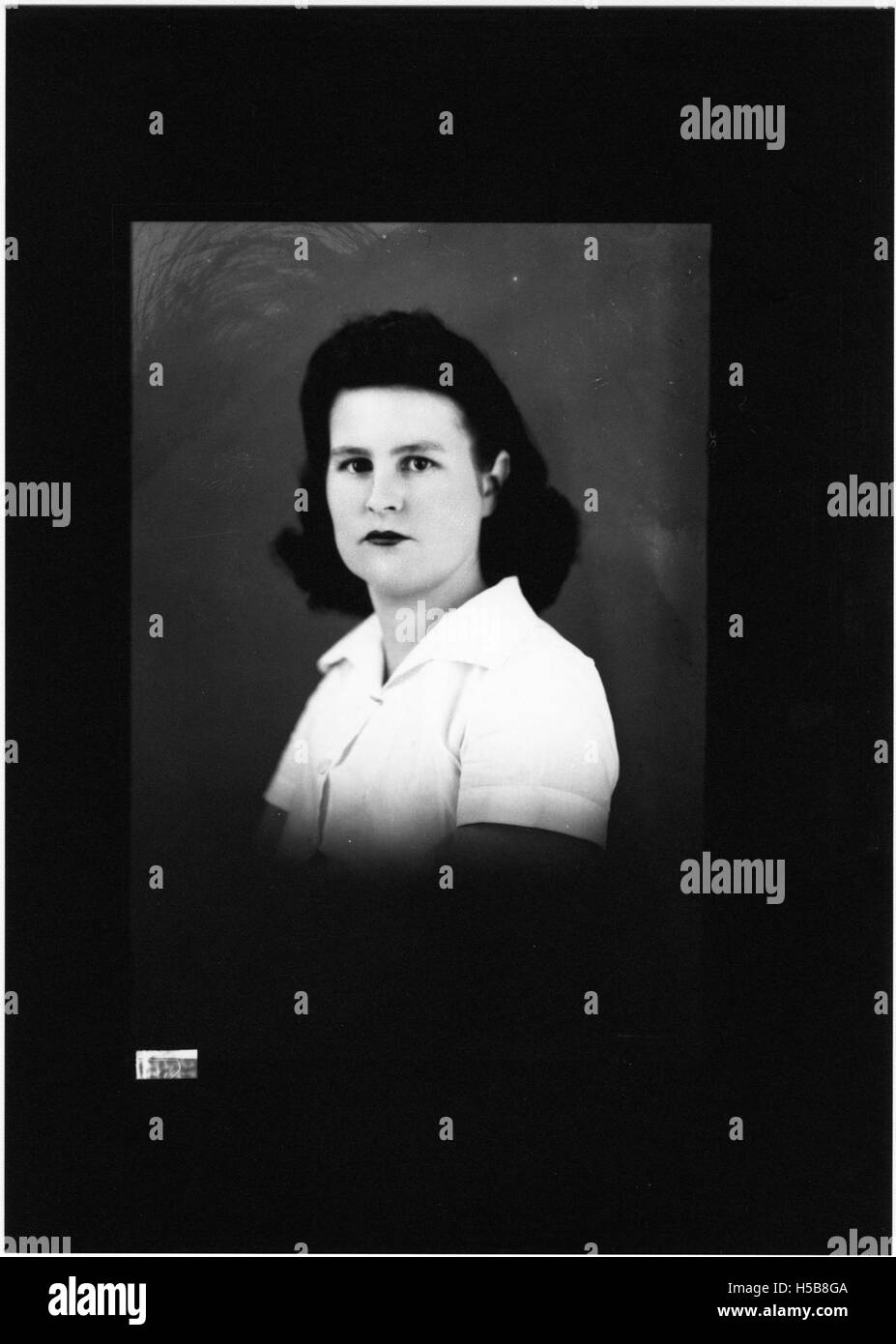 A portrait photograph of an unidentified woman, capturing her likeness ...