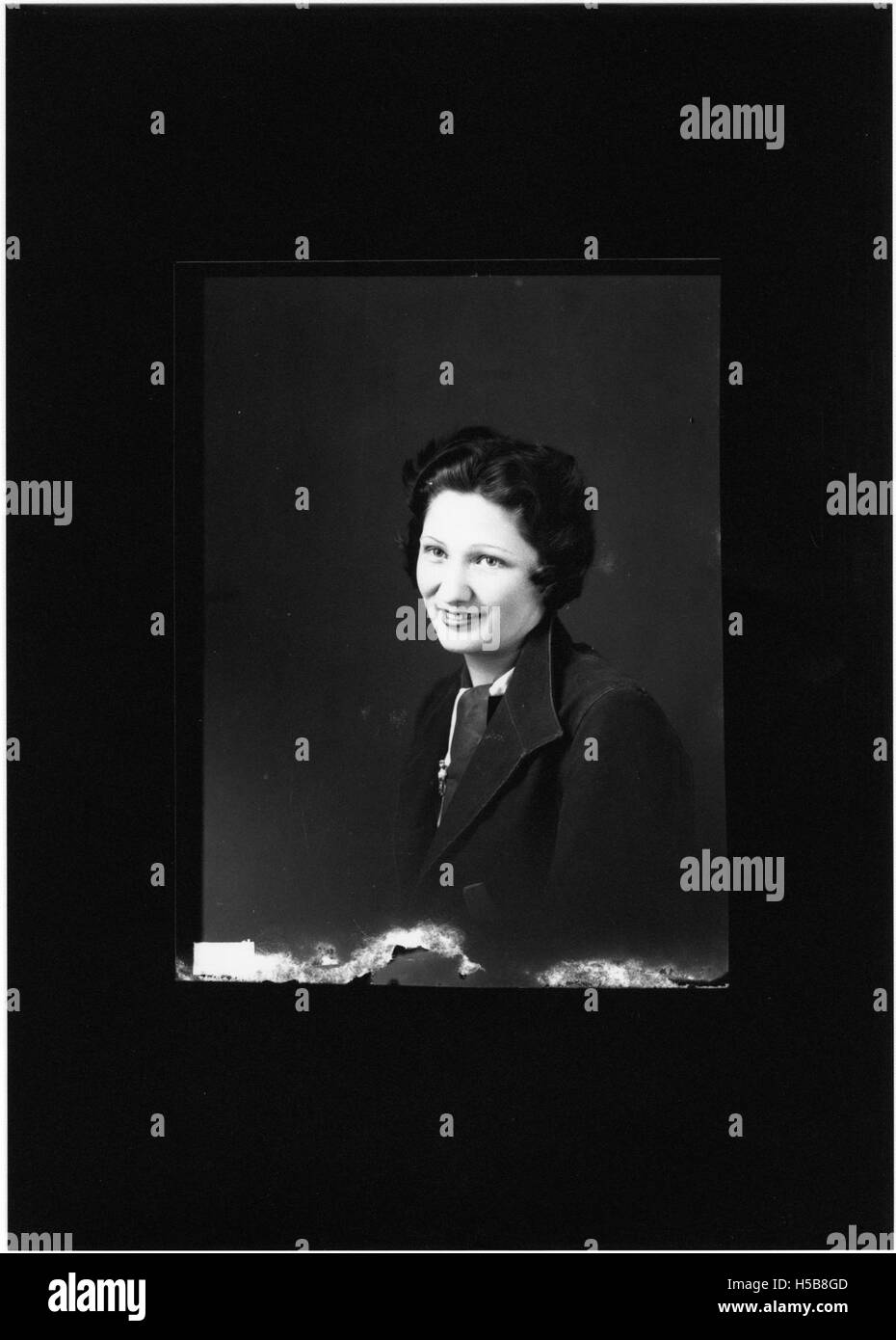 A portrait photograph of an unidentified woman, capturing a moment from ...