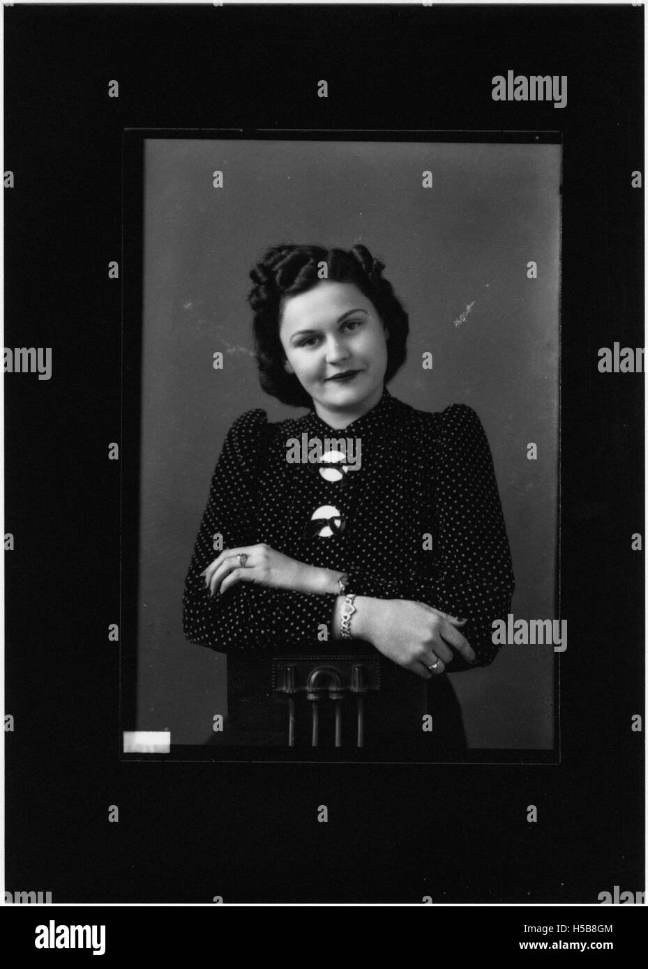 A portrait photograph of an unidentified woman, capturing her ...