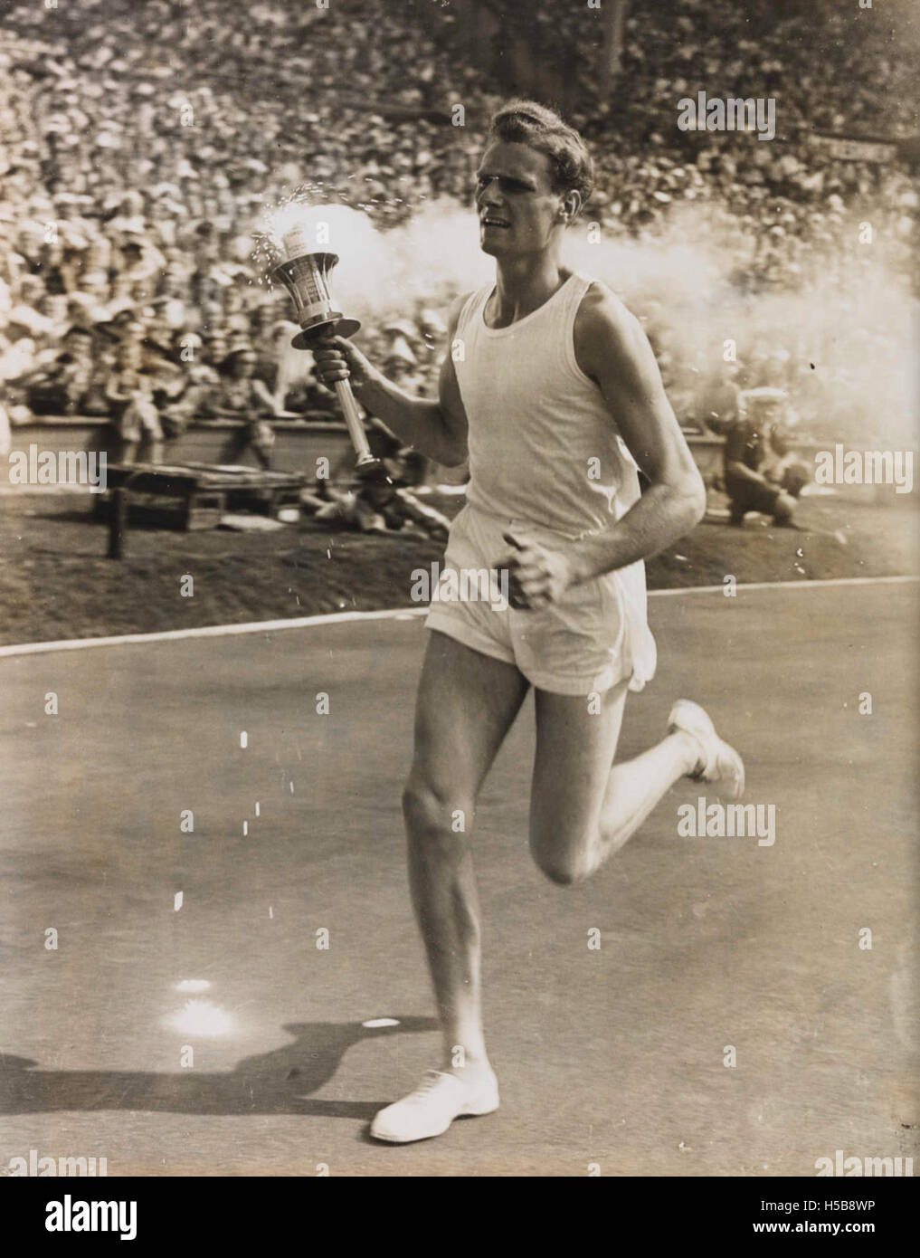 Olympic torch bearer hi-res stock photography and images - Alamy