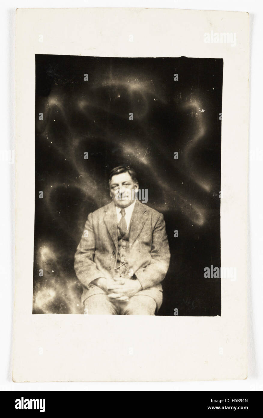 Man surrounded by signs of spirit presence Stock Photo - Alamy