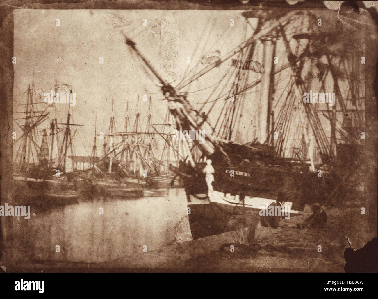 The image shows the Leith docks, with the ship 'Cockburn' docked at the ...