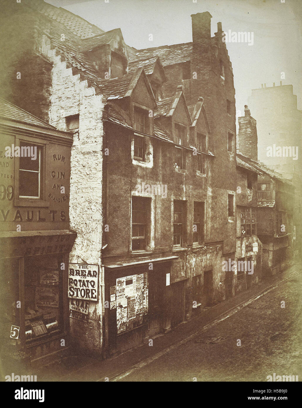 The Cowgate in Edinburgh, Scotland, is shown in this historical ...