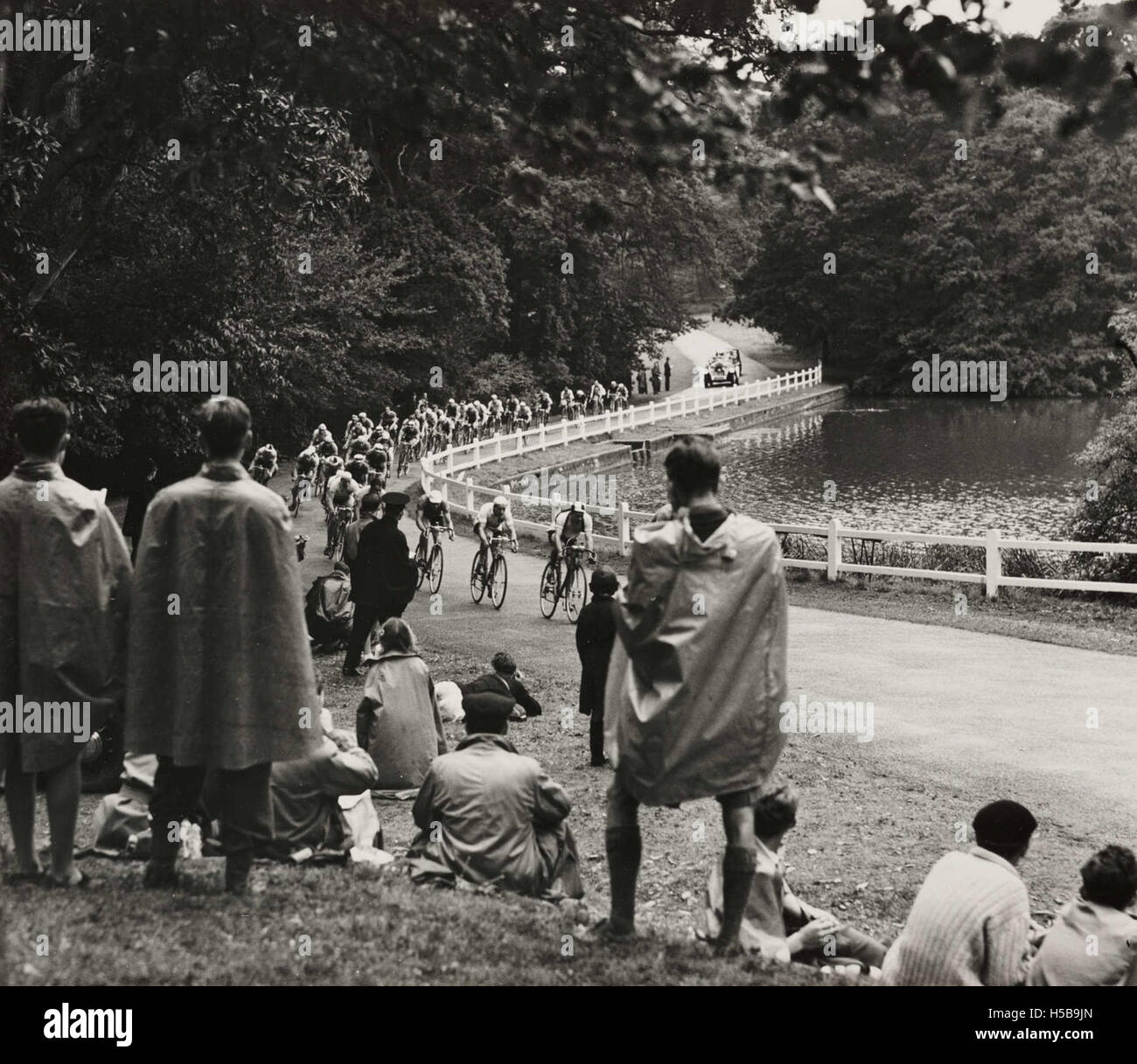 Spectators gathered to watch an Olympic cycle race during the 1948 ...