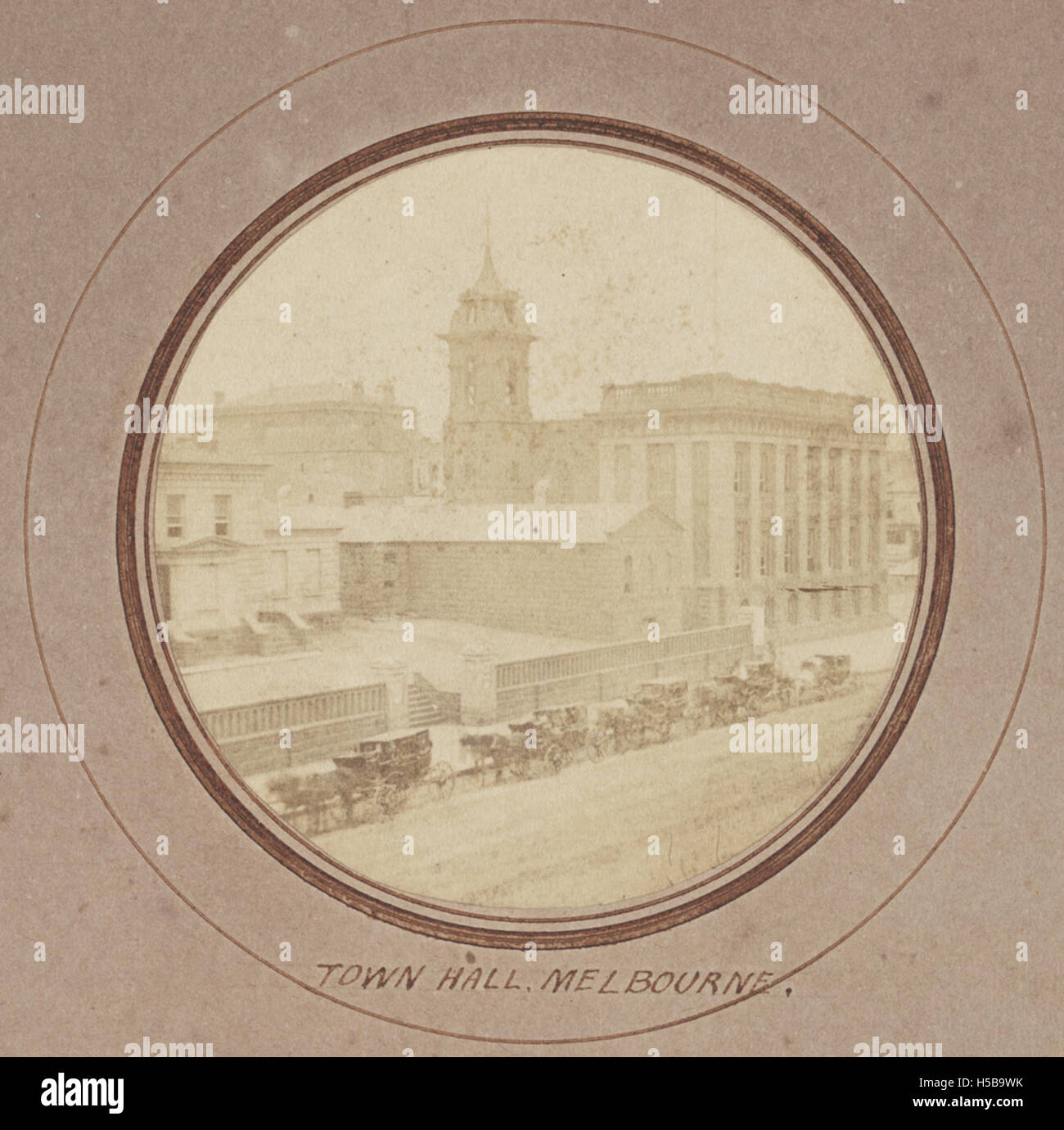 The image shows the Melbourne Town Hall, a prominent civic building in ...