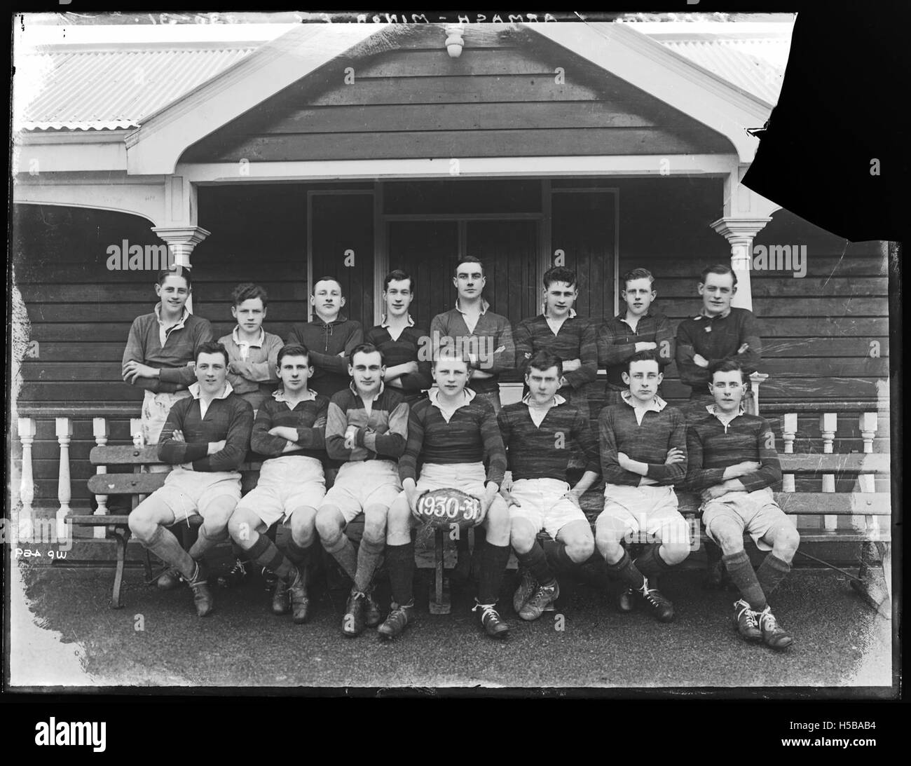 A group portrait of a football team, possibly taken before or after a ...