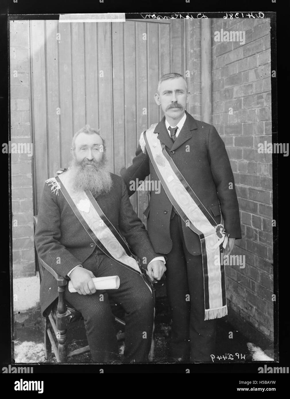 Two gentlemen wearing sashes Stock Photo - Alamy
