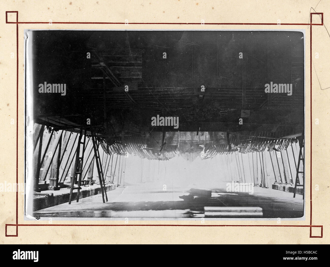 This image shows the construction of a ship's hull, a crucial step in ...