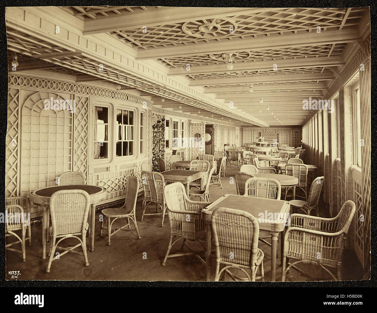 The Cafe Parisien on the RMS Titanic is depicted, showcasing one of the ...