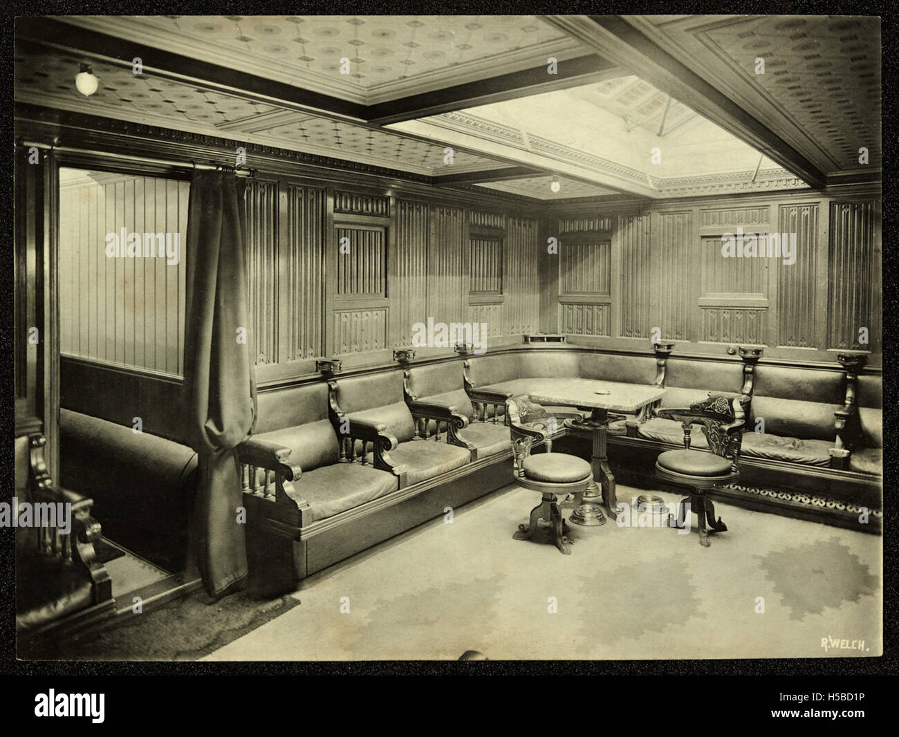 The interior of a ship’s lounge area, designed for relaxation and ...