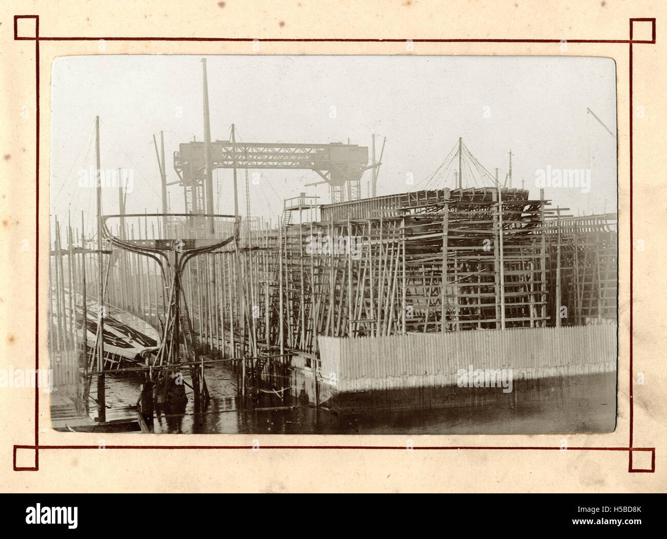 This image depicts the construction of a ship, showcasing the intricate ...
